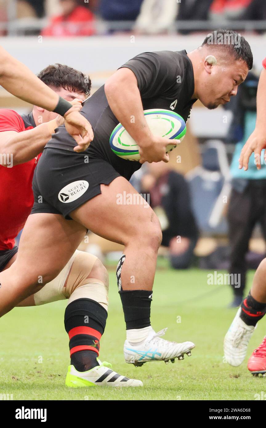 Tokyo, Japan. 2nd Jan, 2024. Tenri University prop Fuma Matsuno carries ...