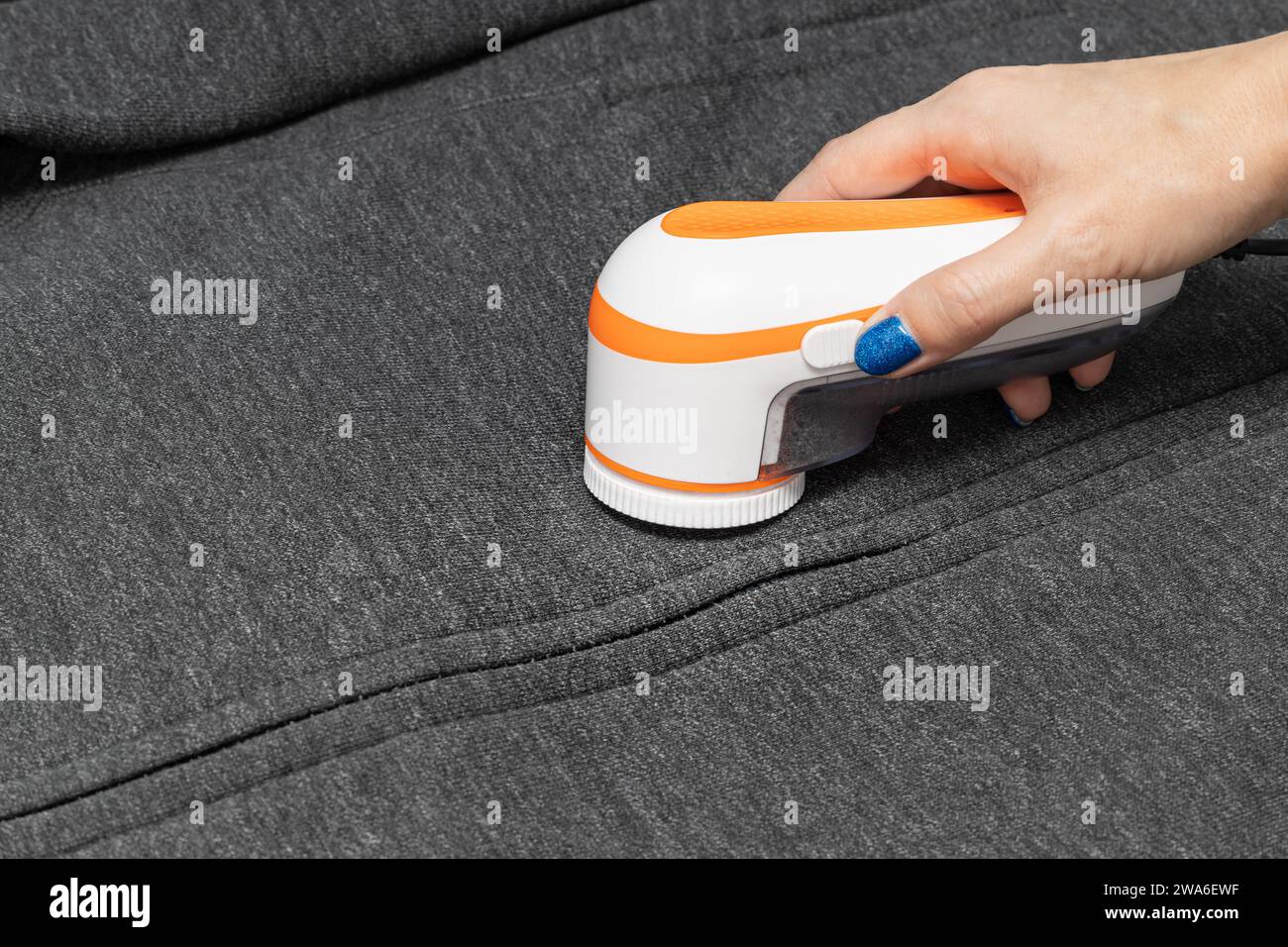 Woman removing her clothes hi-res stock photography and images - Alamy