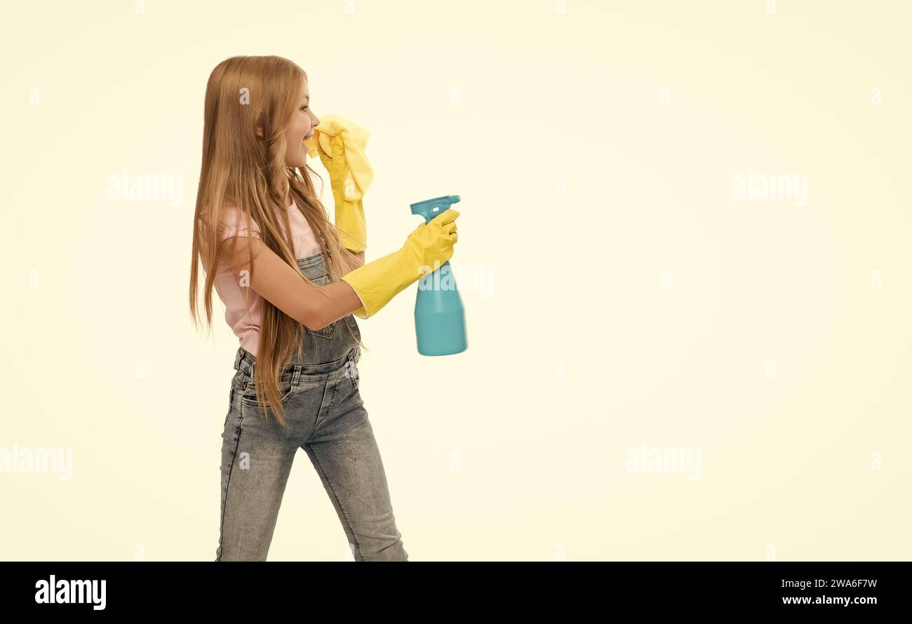 photo of positive cleaner girl with washing gloves. cleaner girl in ...