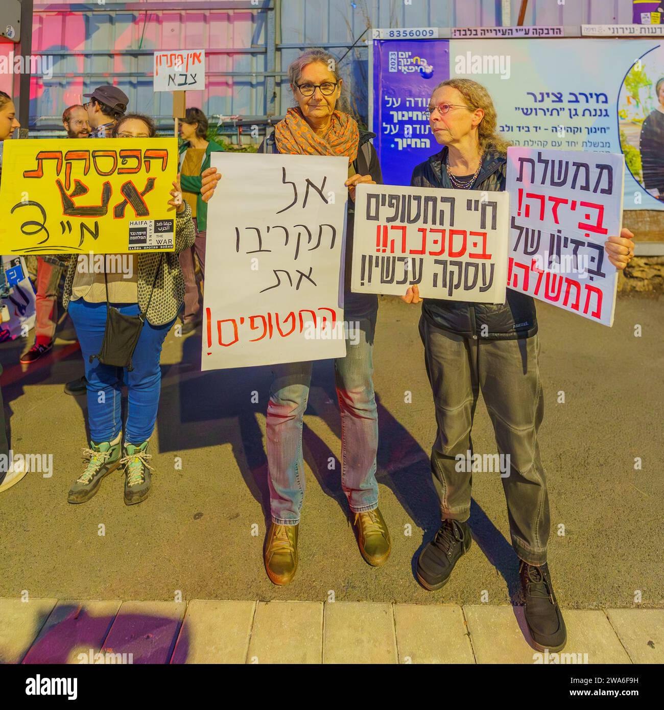 Haifa, Israel - December 30, 2023: People with signs calling for peace ...