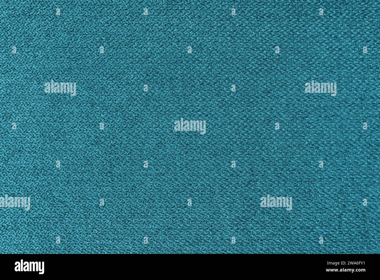 Textile background, turquoise coarse fabric texture, jacquard woven ...