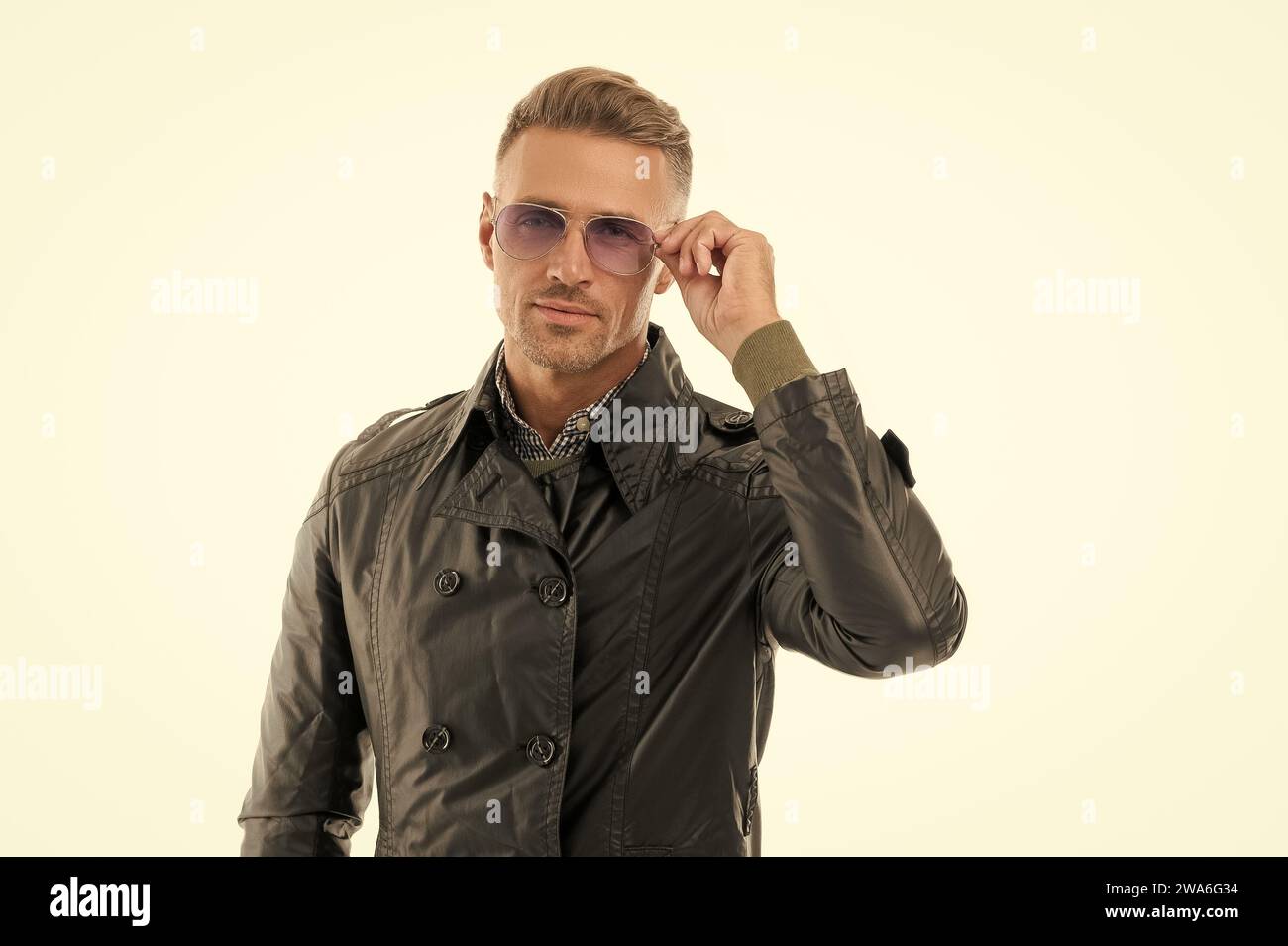 studio shot of handsome grizzled man. adult grizzled man in glasses ...