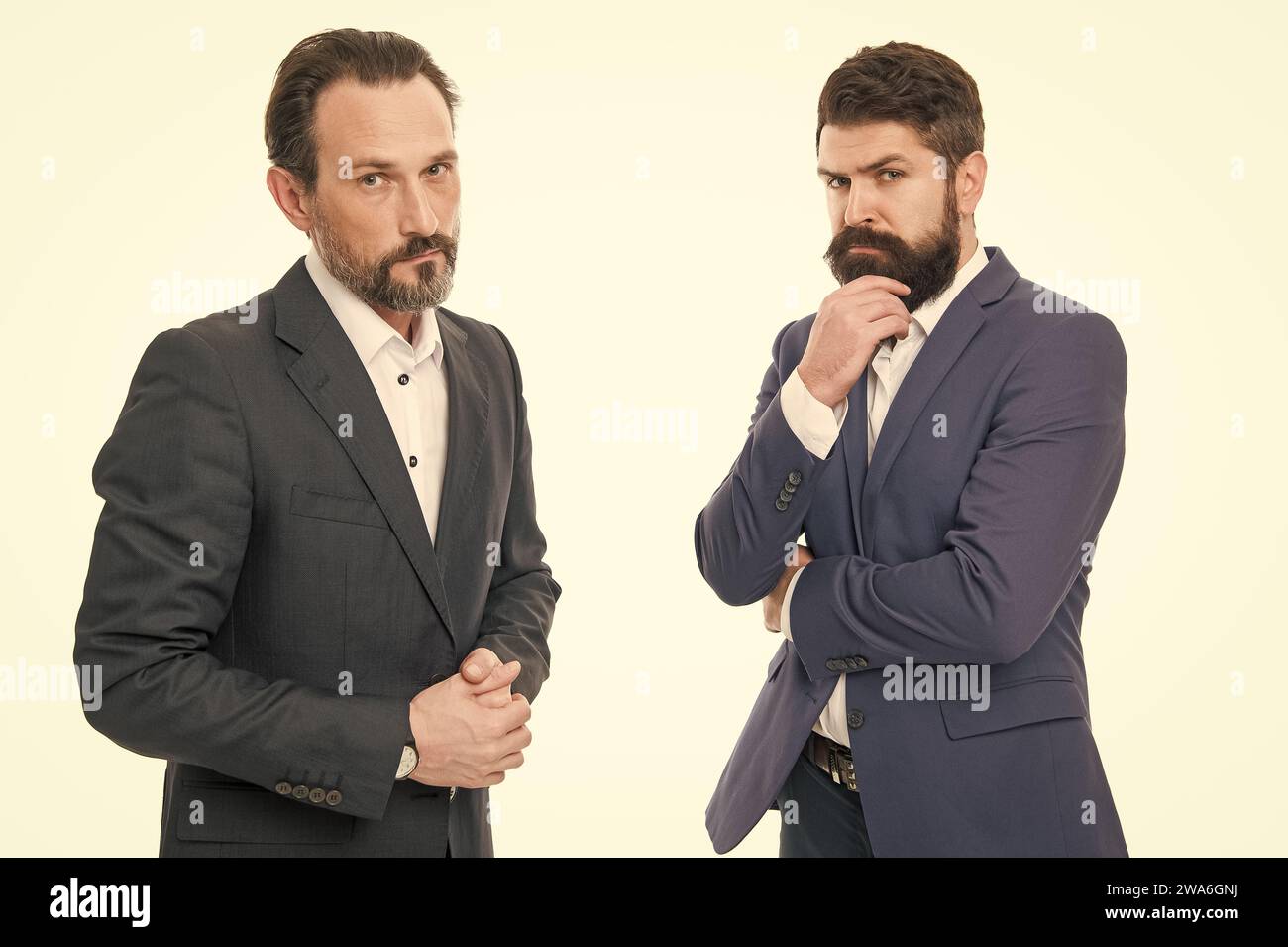 Stay classy. Serious gentlemen isolated on white. Businessmen in formal ...