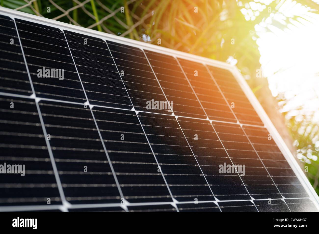 Cells on solar panel with bright sunny tropical background Stock Photo ...