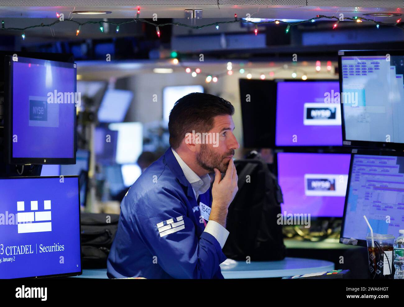 New York, United States. 02nd Jan, 2024. Traders work on the floor of ...