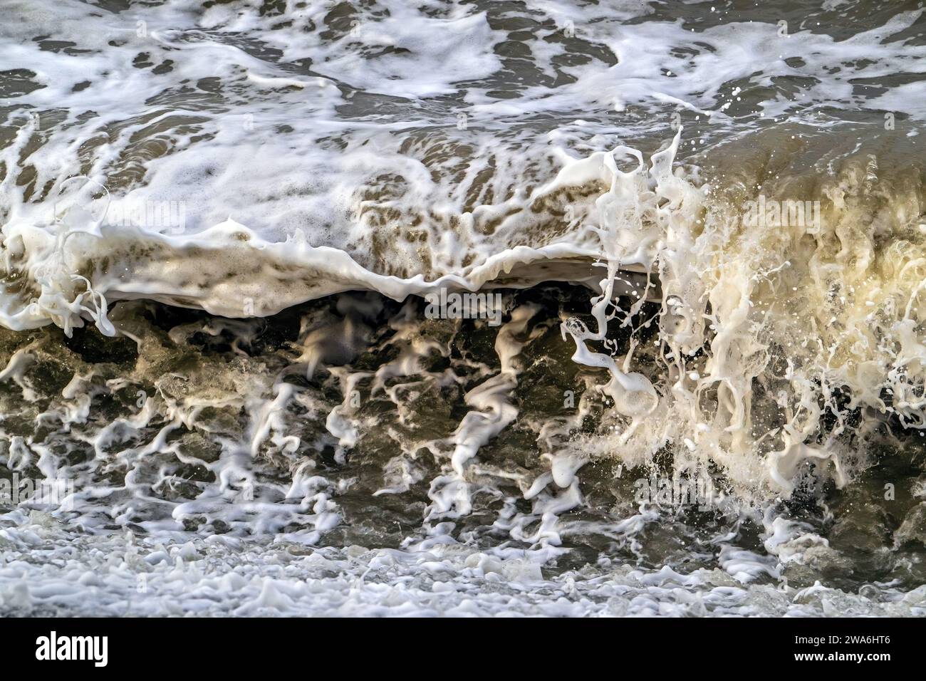 Wave crashing /rolling on beach during winter storm along North Sea ...