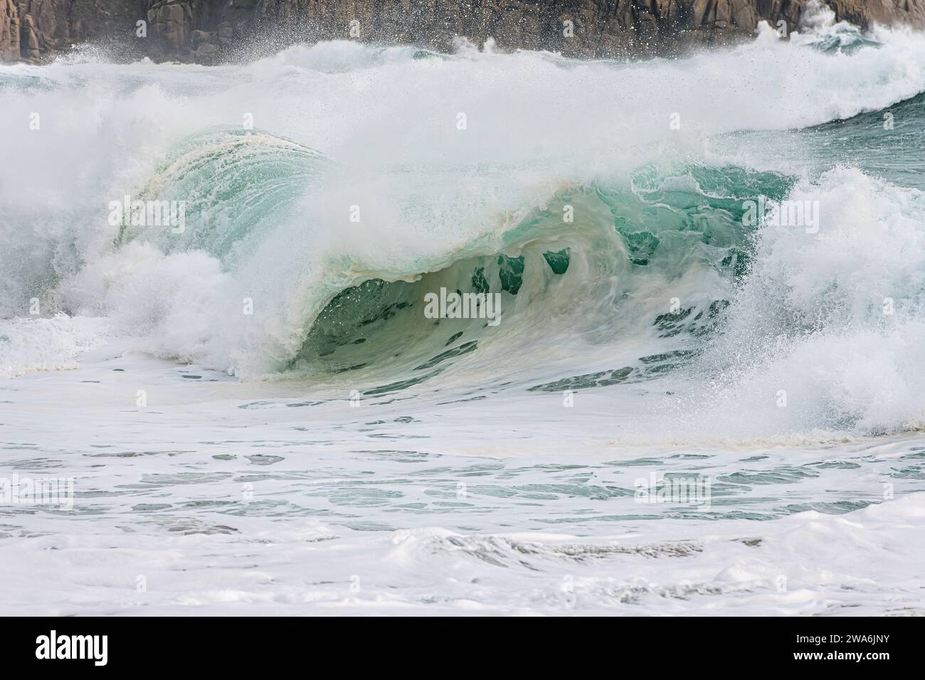 High winds and big waves during Storm Gerrit at Porthcurno beach ...