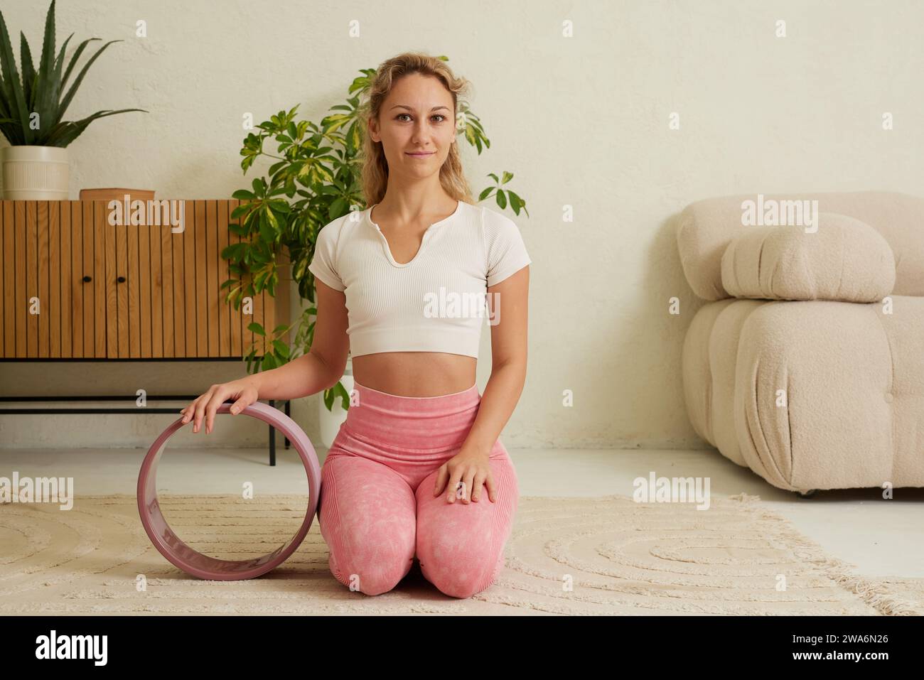 young flexible girl doing gymnastics, flexibility and stretching using ...