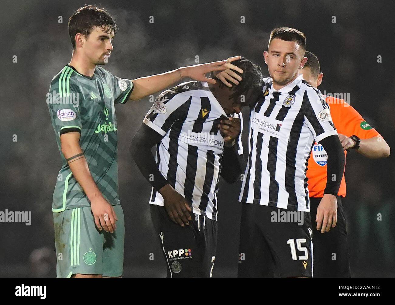 St Mirren's Toyosi Olusanya (centre) reacts after being shown a red ...