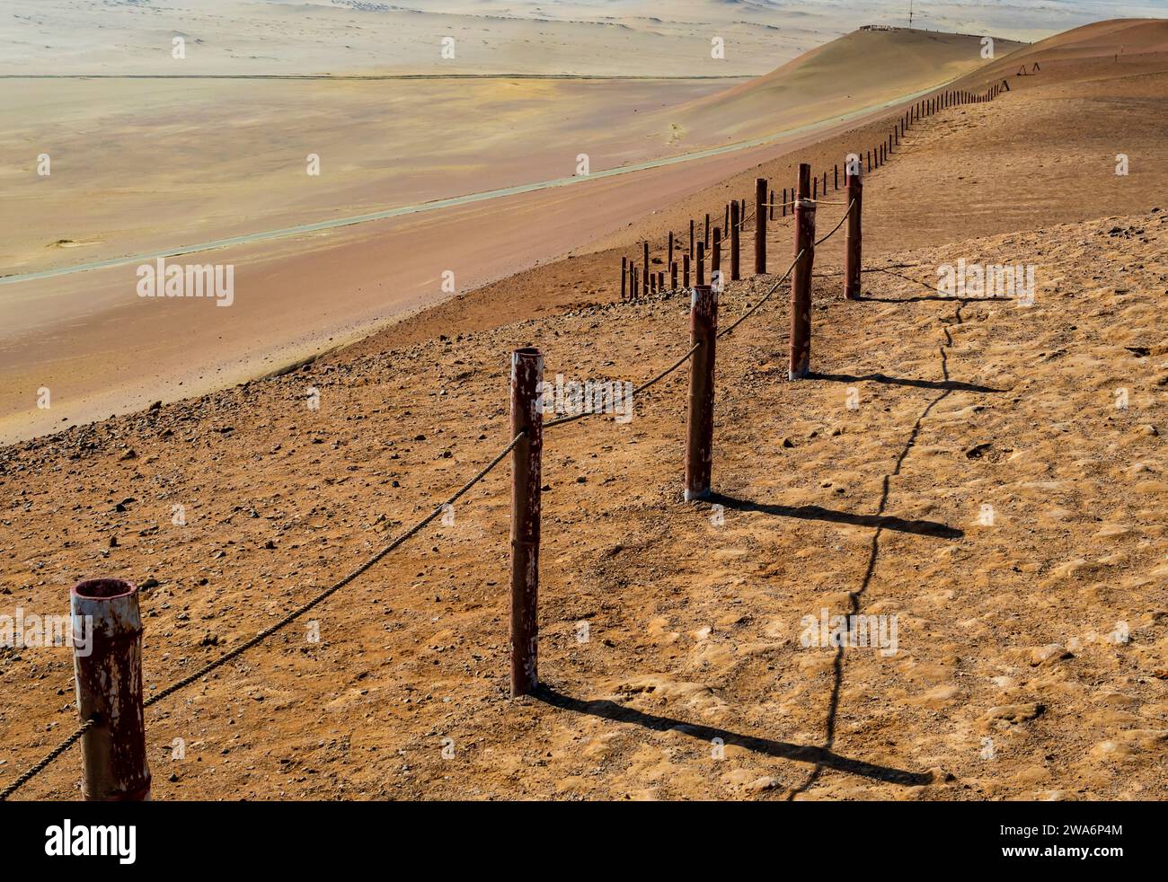 Stunning desert view in Paracas National Reserve with rusty metal fence ...