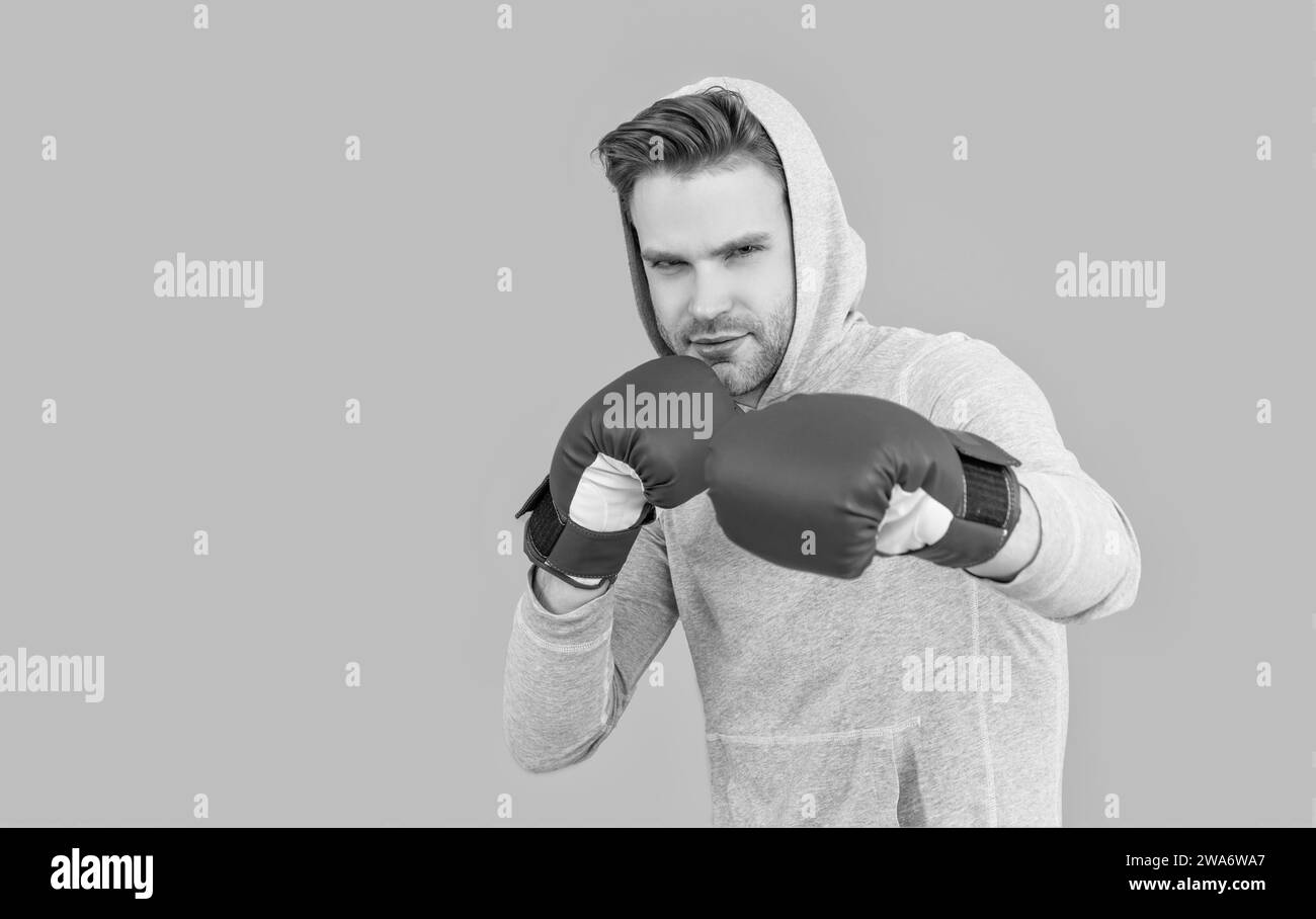 Boxer fighter standing in boxing stance. Fit sportsman wearing boxing ...