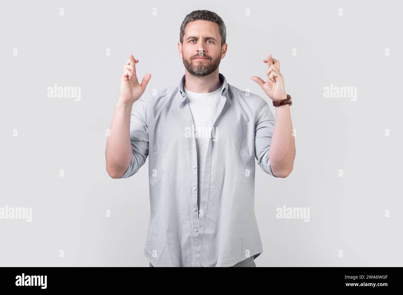 wishing man make wish with raised finger. wishing man make wish ...