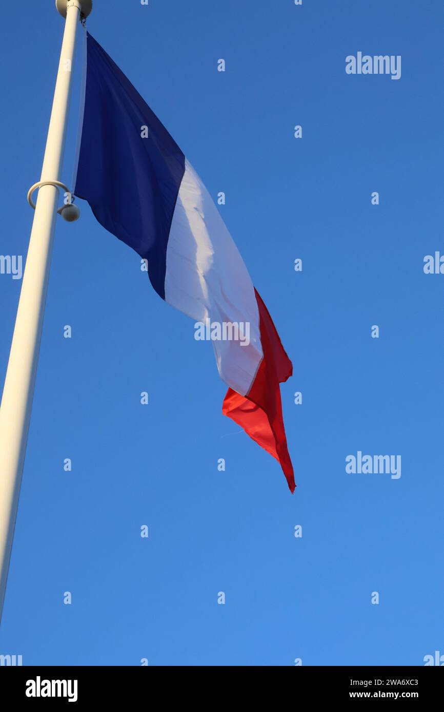 The French flag flying in the wind at the port in Pornic - Le drapeau ...