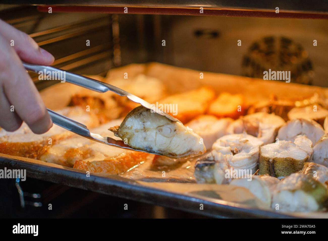 The process of preparing fish at home. Homemade baked goods in the ...