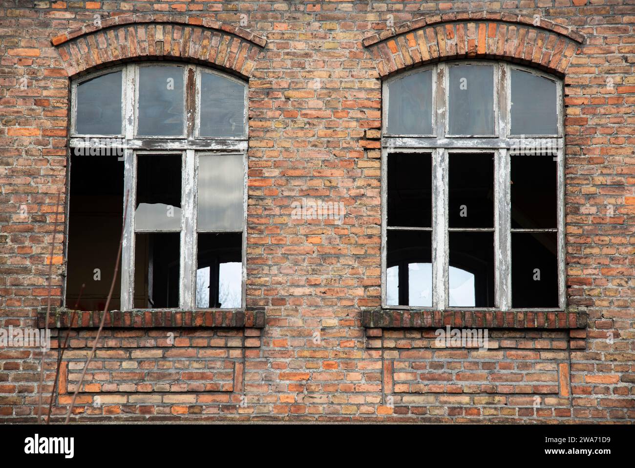 Facade of an old destroyed and abandoned factory Stock Photo - Alamy