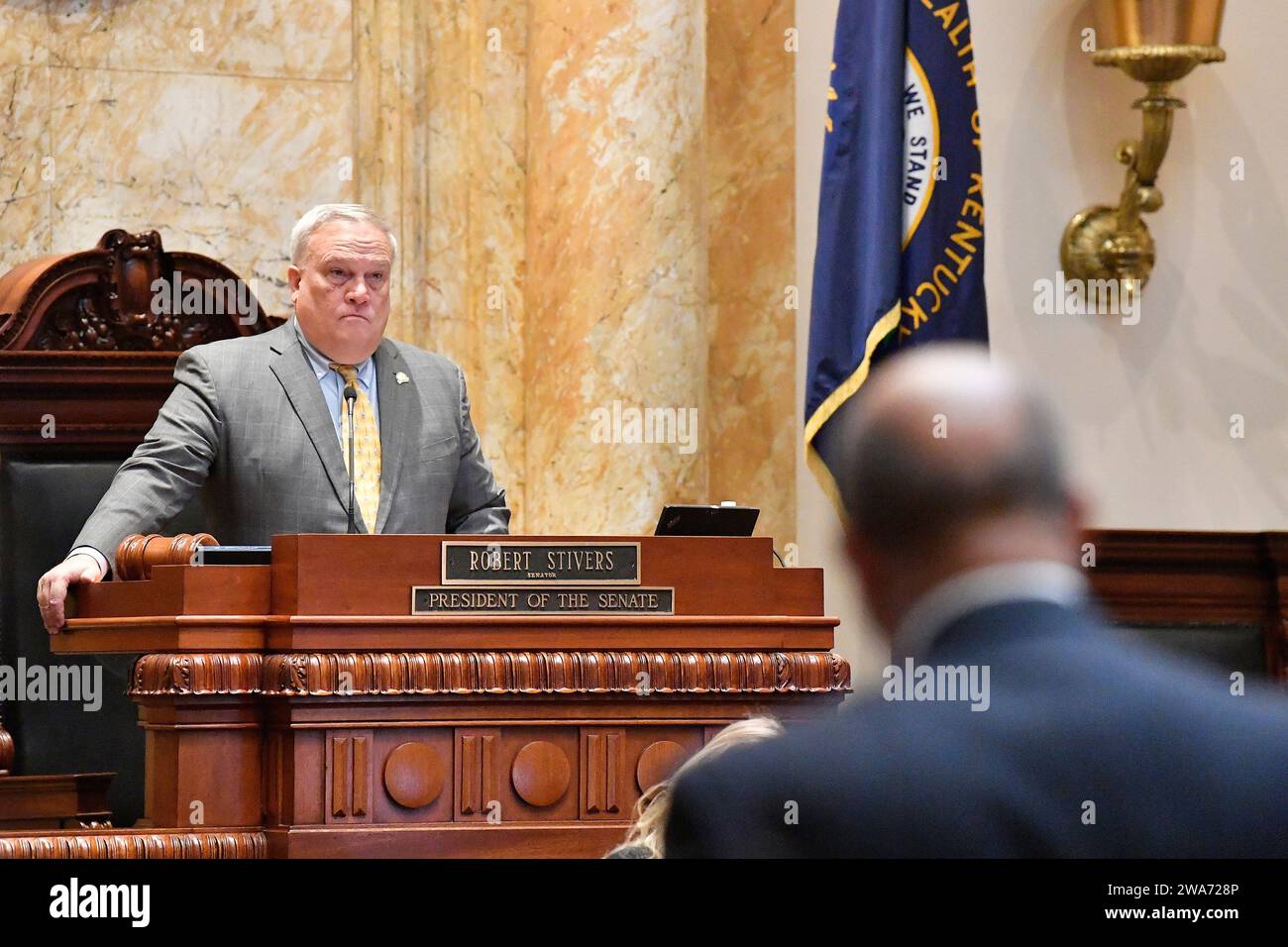Kentucky Senate President Robert Stivers listens as a Senate member ...