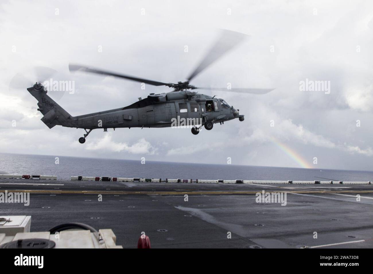 US military forces. A U.S. Navy SH-60 Seahawk assigned to Amphibious ...