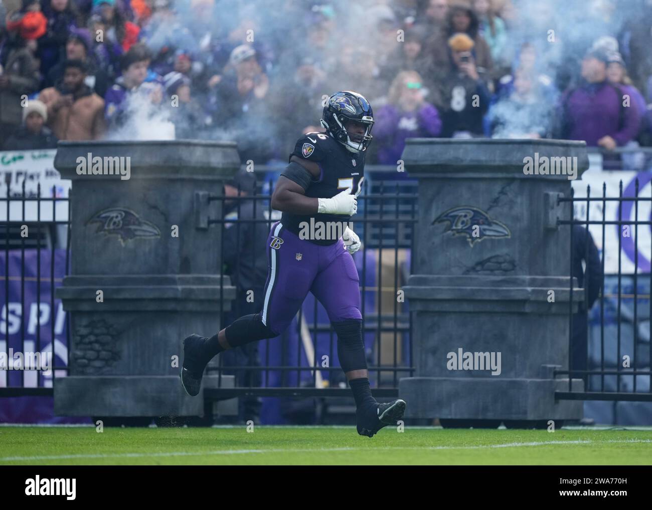 Baltimore Ravens guard John Simpson (76) before of an NFL football game ...