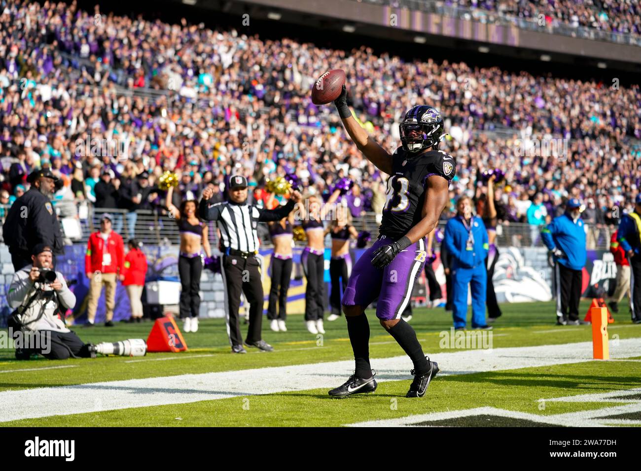Baltimore Ravens running back Justice Hill in action an NFL football ...
