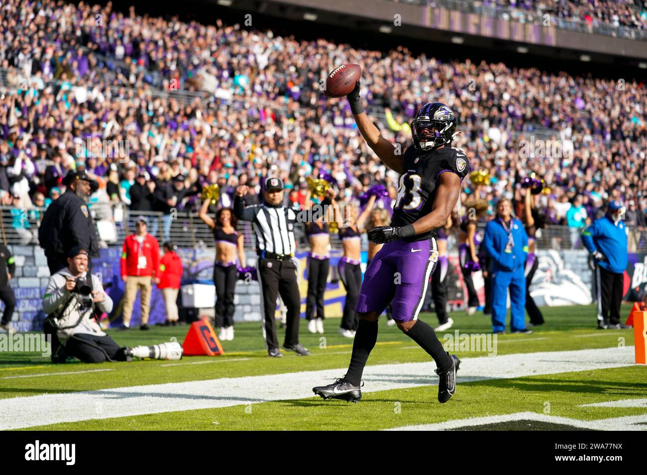 Baltimore Ravens running back Justice Hill in action an NFL football ...