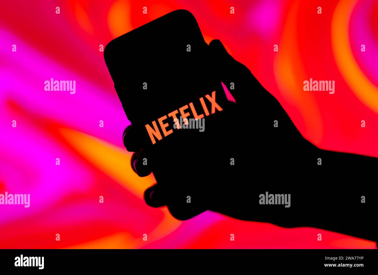 In this photo illustration, the Netflix logo is seen displayed on a ...