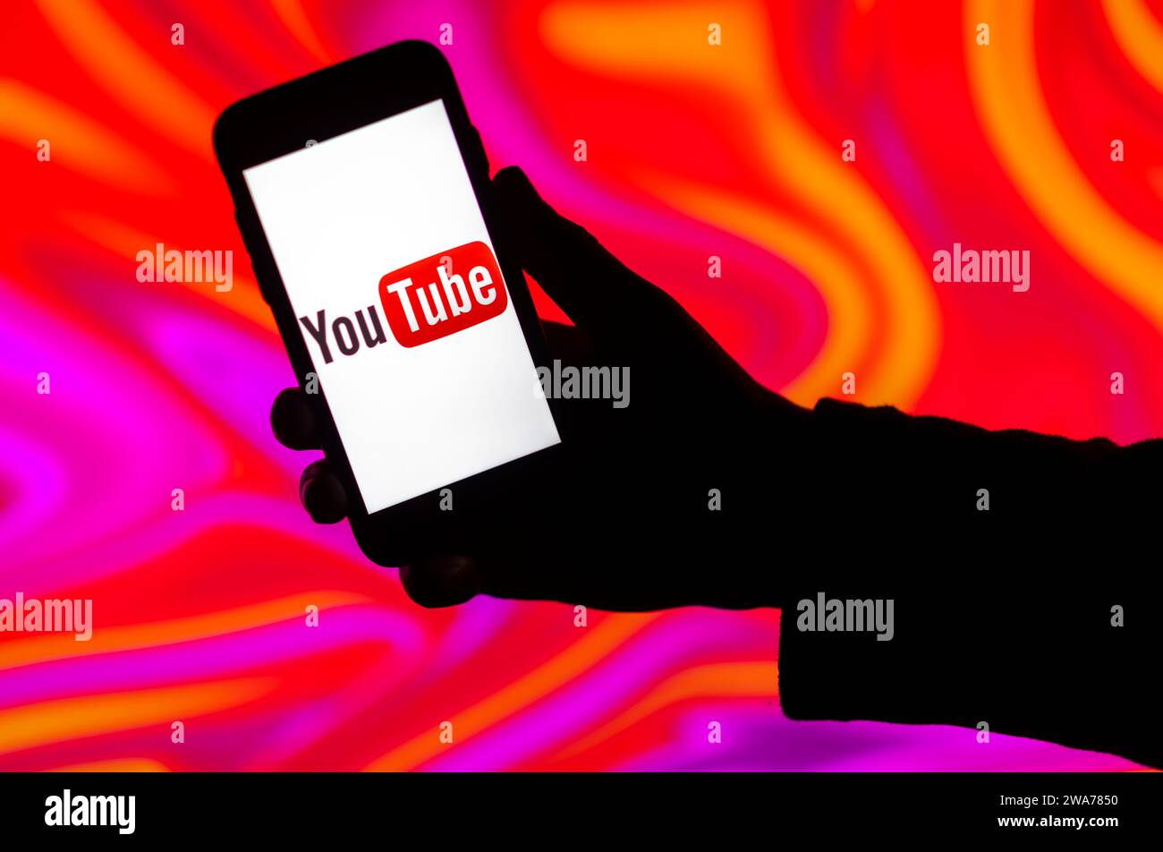 In this photo illustration, the YouTube logo is seen displayed on a ...