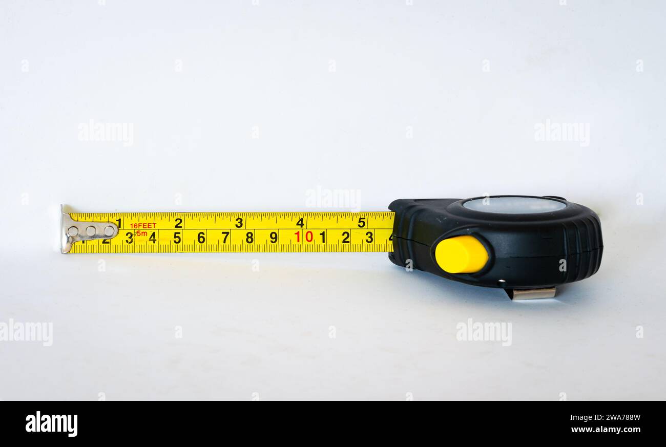 Self retracting metal measuring tape, isolated on white background ...
