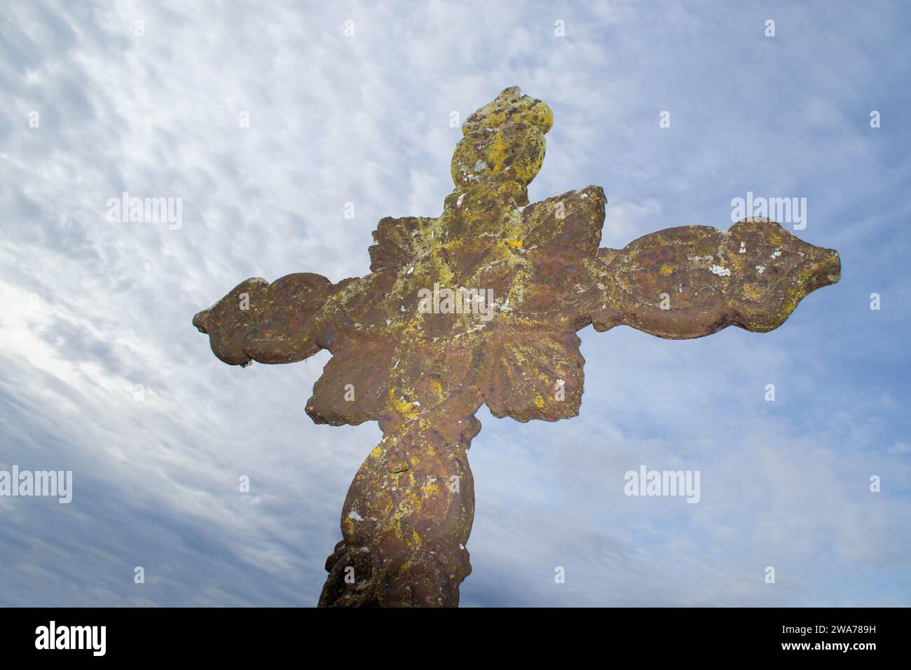 Big metal christian cross high in the blue sky. Symbol of love for Jesus. Catholic church ...