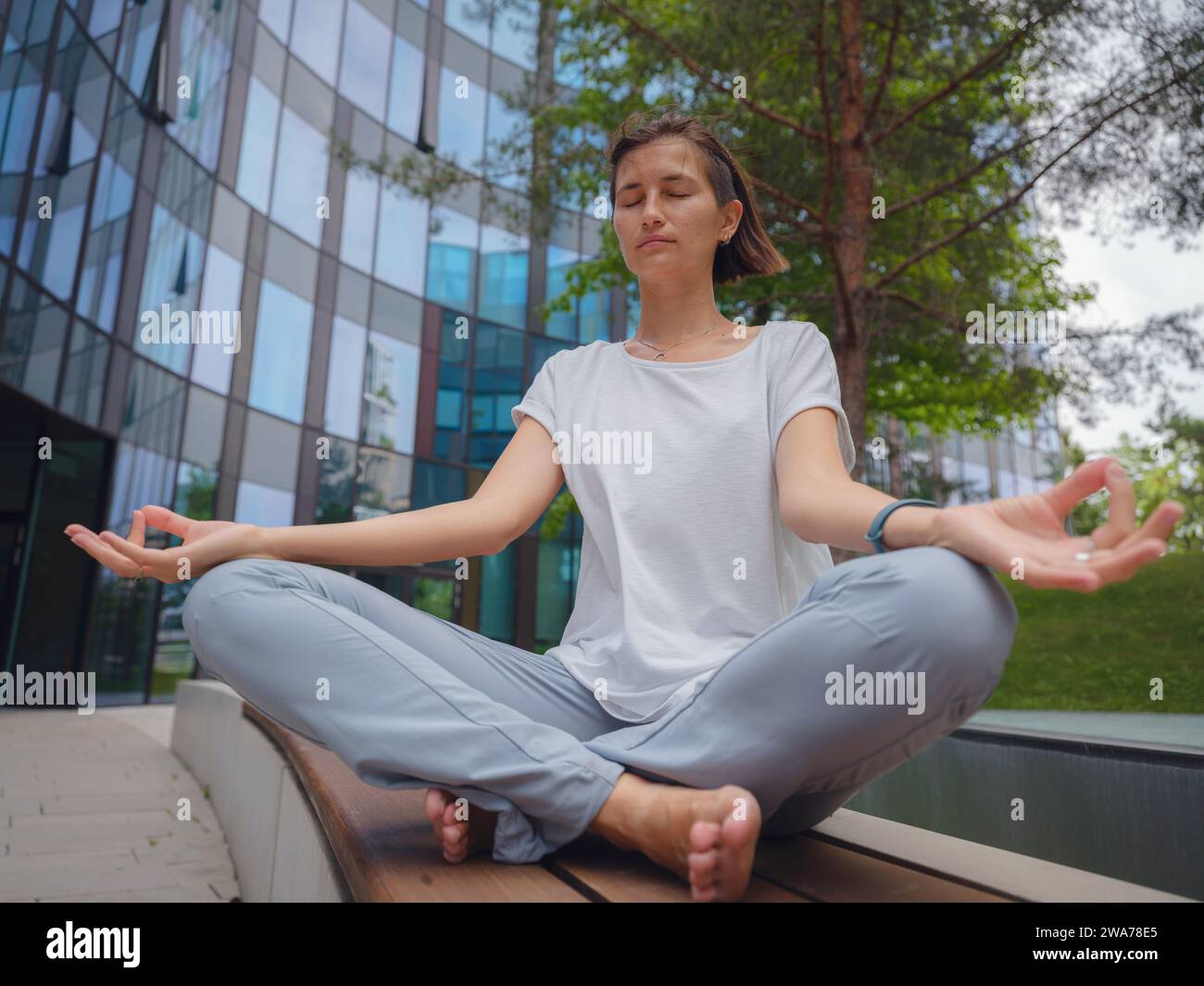 De-stress, unwind idea. peaceful female freelance employee practicing ...