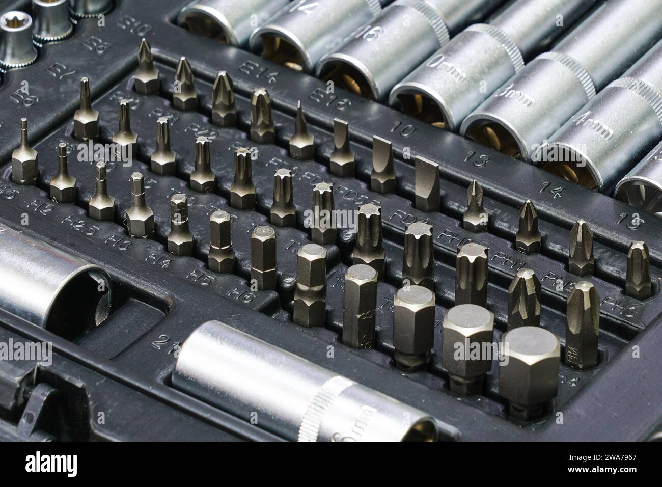 Tool box, tool kit closeup with set of hex, torx and screwdriver bits ...
