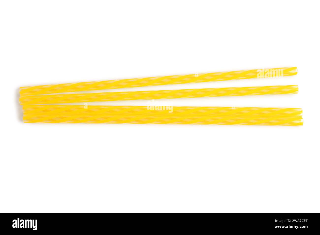 Yellow plastic straws isolated on white background Stock Photo - Alamy