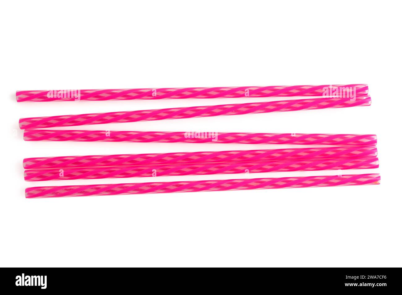 Pink plastic straws isolated on white background Stock Photo - Alamy