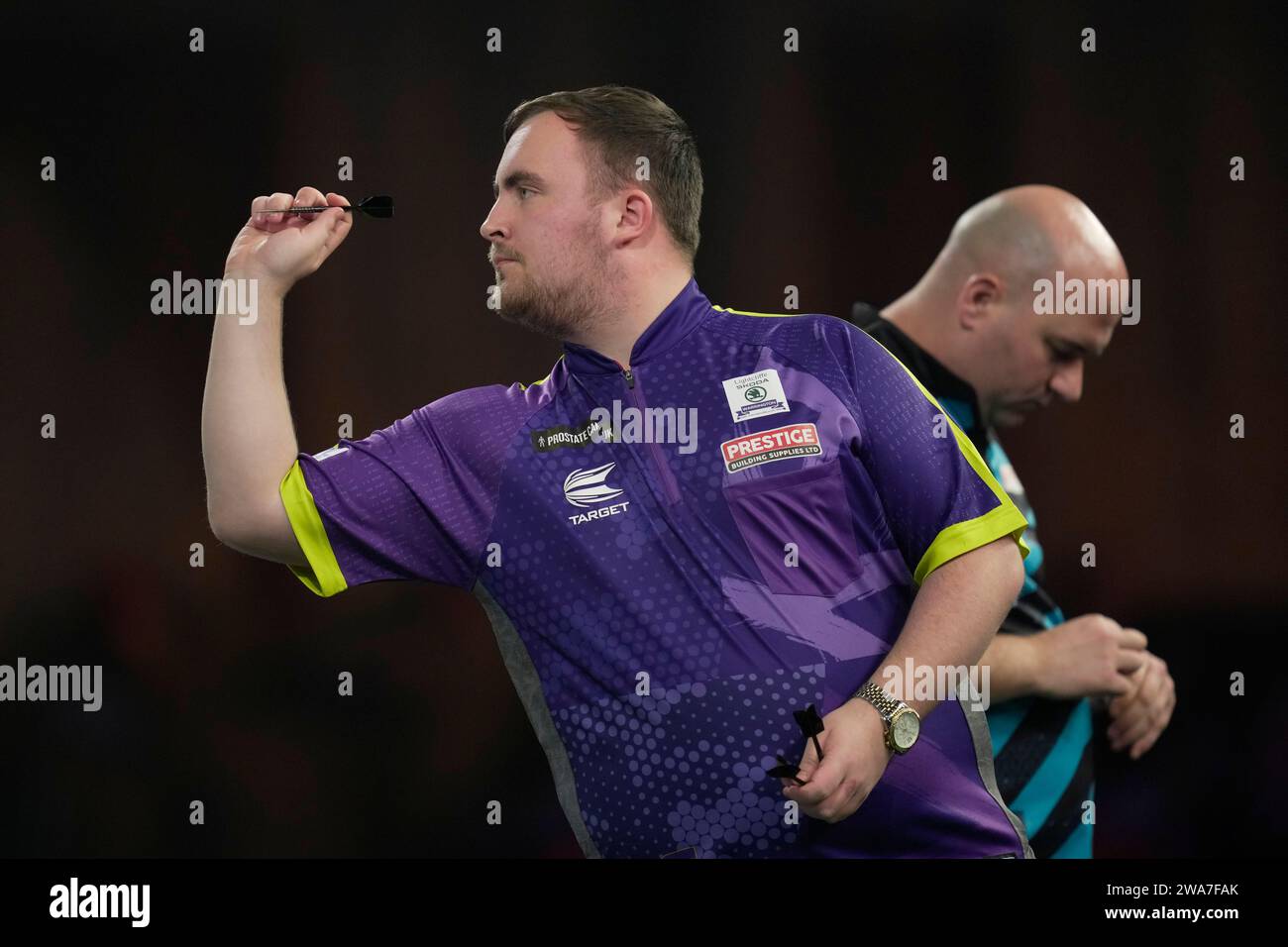 Luke Littler of England in action during the semifinal match against ...