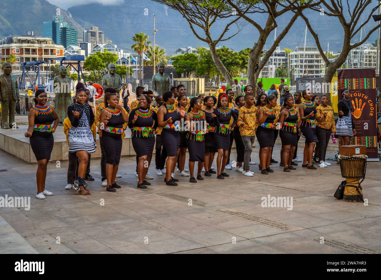Children in traditional Zulu clothes dancing and performing in the ...
