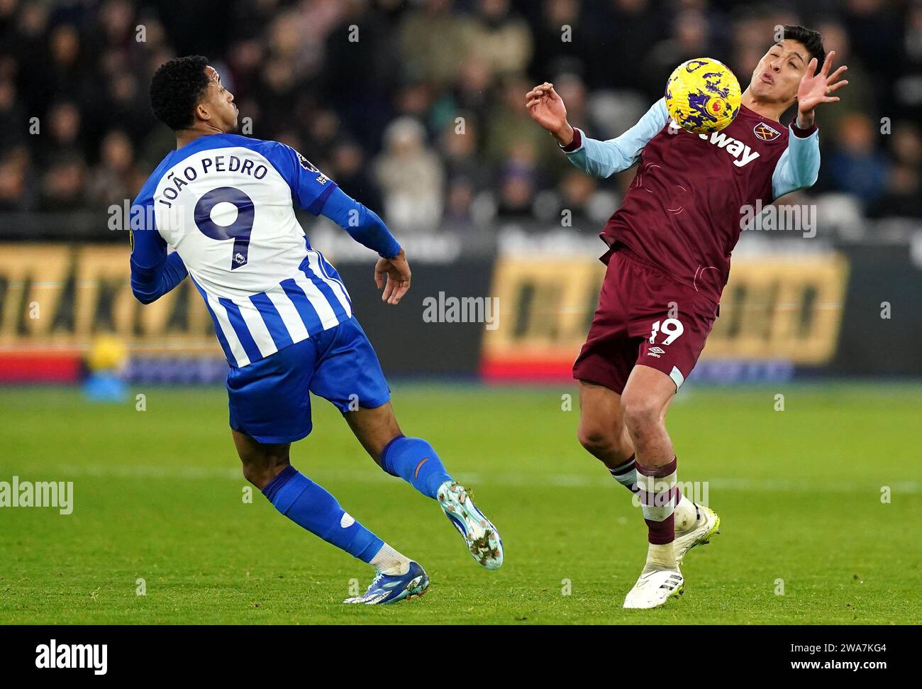 West Ham United's Edson Alvarez (right) controls the ball as Brighton ...