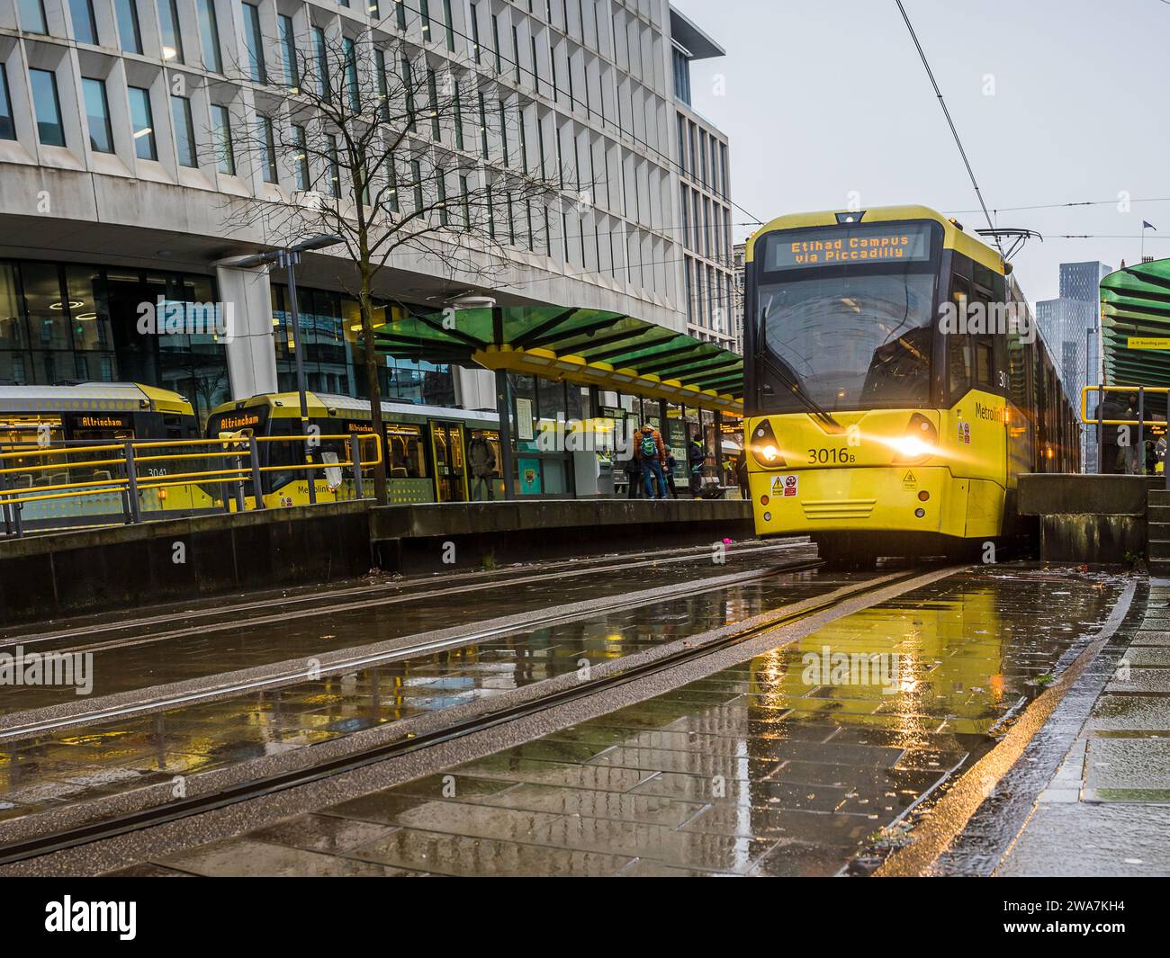 A vivid yellow tram pictured in St Peters Square station on the ...