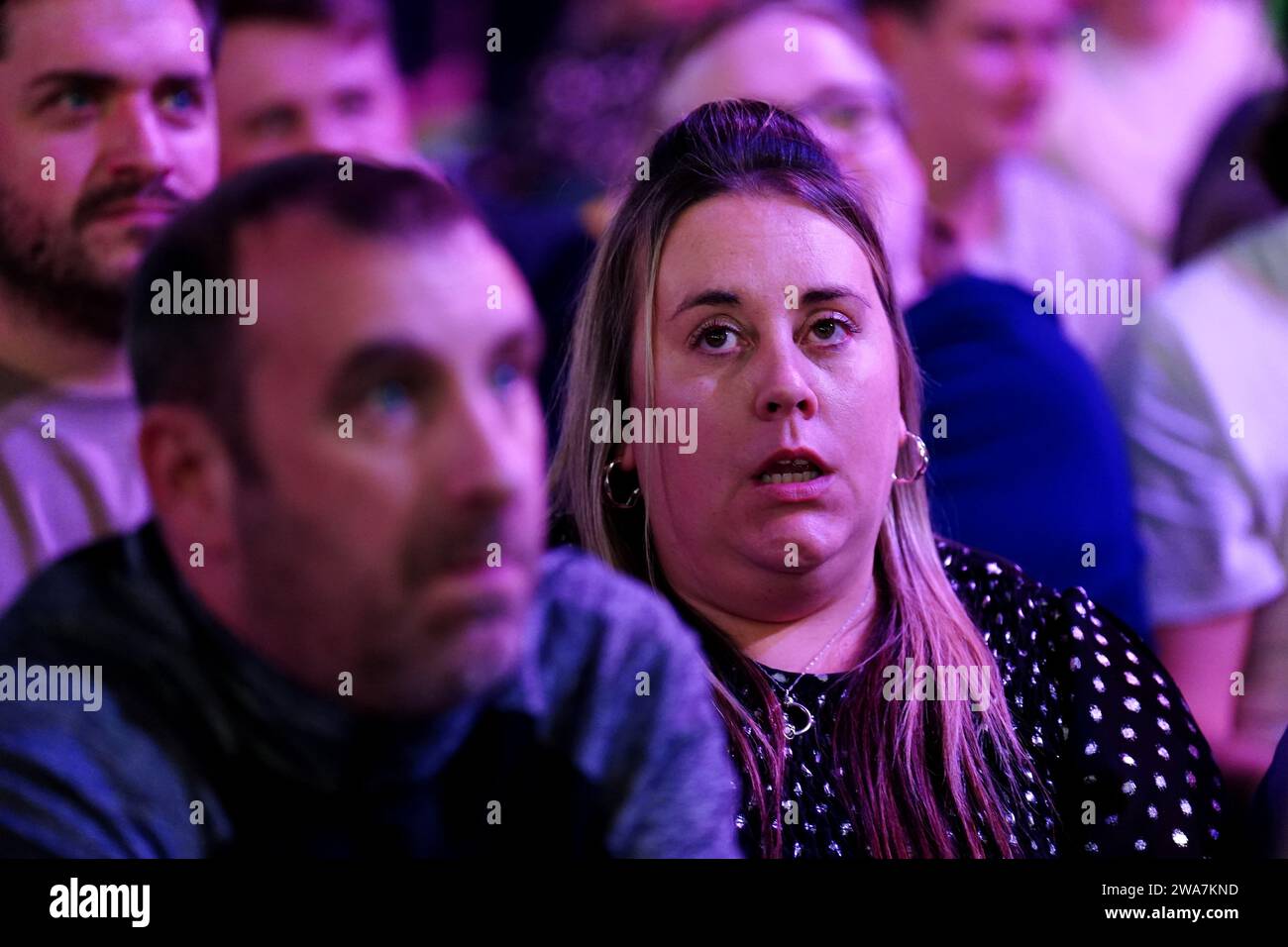 Friends and family of Luke Littler (not pictured) can be seen during ...