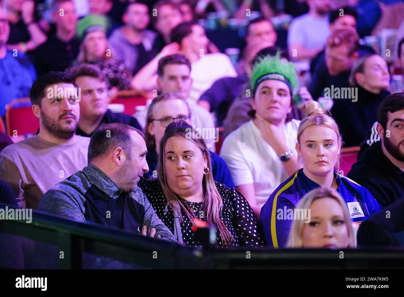 Friends and family of Luke Littler (not pictured) can be seen during ...