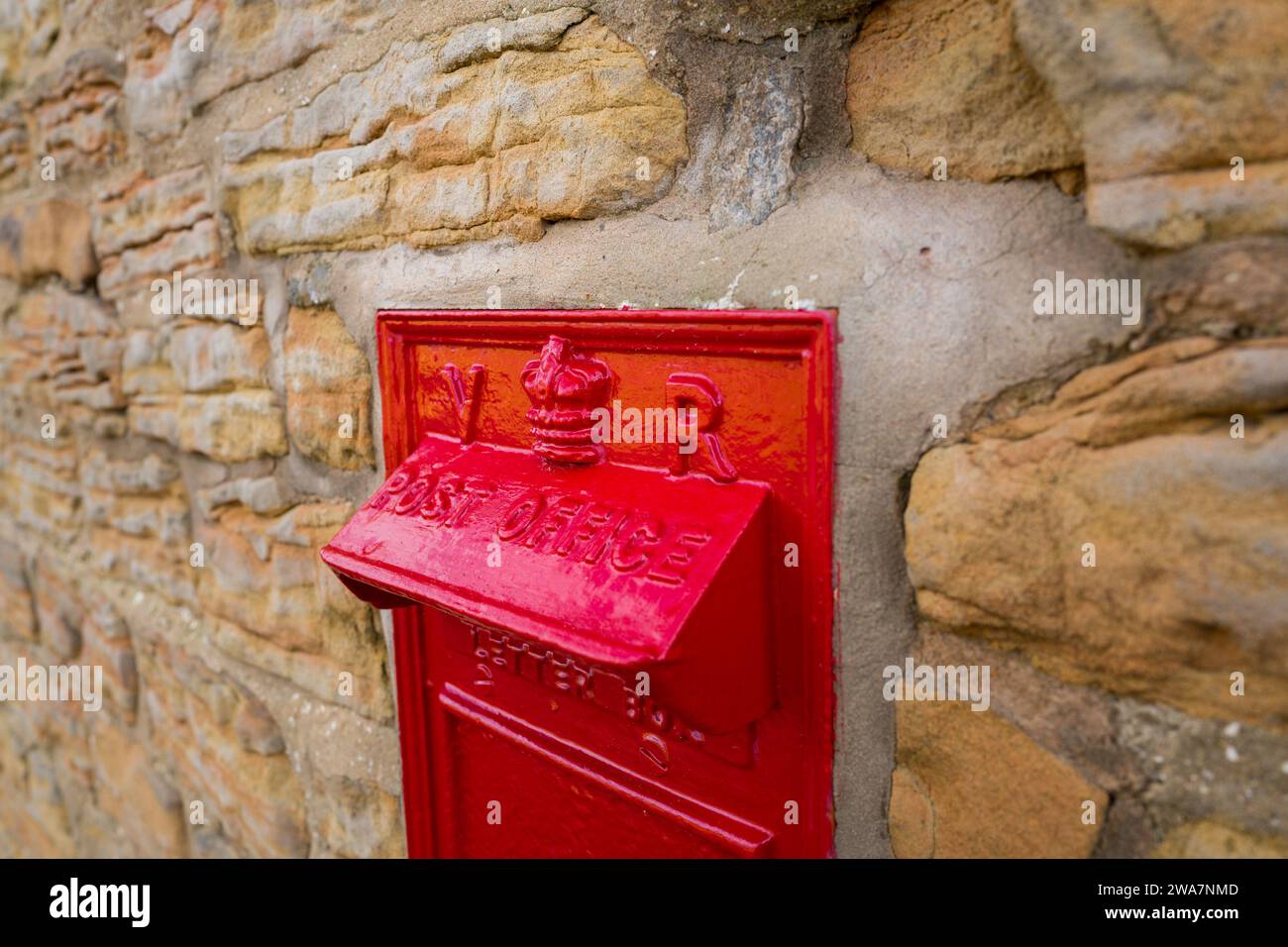 Queen Victoria, victorian red letter box mounted into a stone wall ...