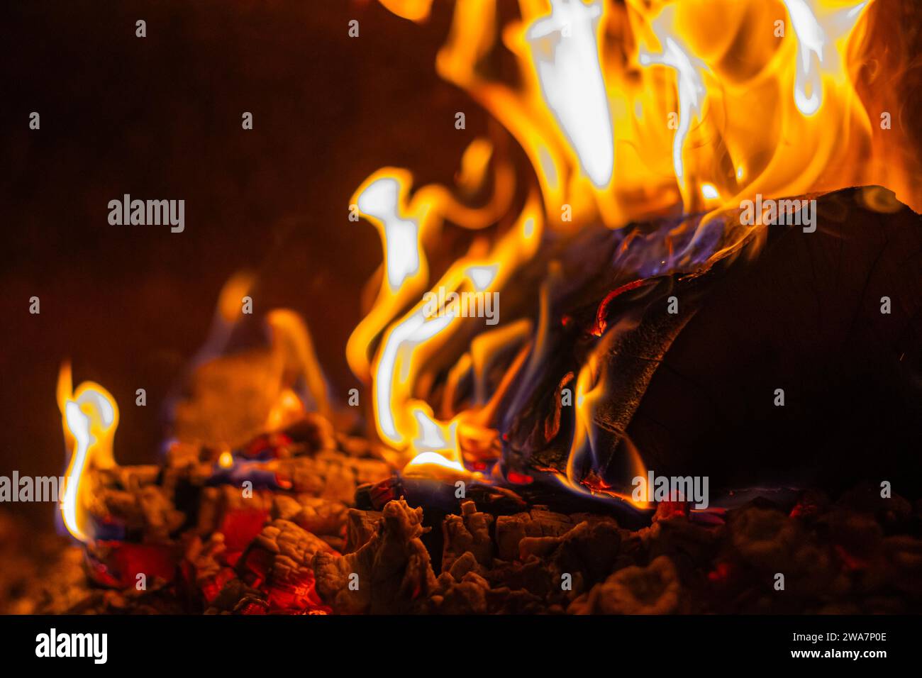 Warm and Inviting Fireplace Scene: Wooden Logs Ablaze in Hearth Stock ...