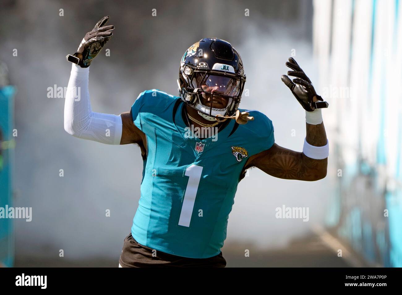Jacksonville Jaguars running back Travis Etienne Jr. (1) takes the ...