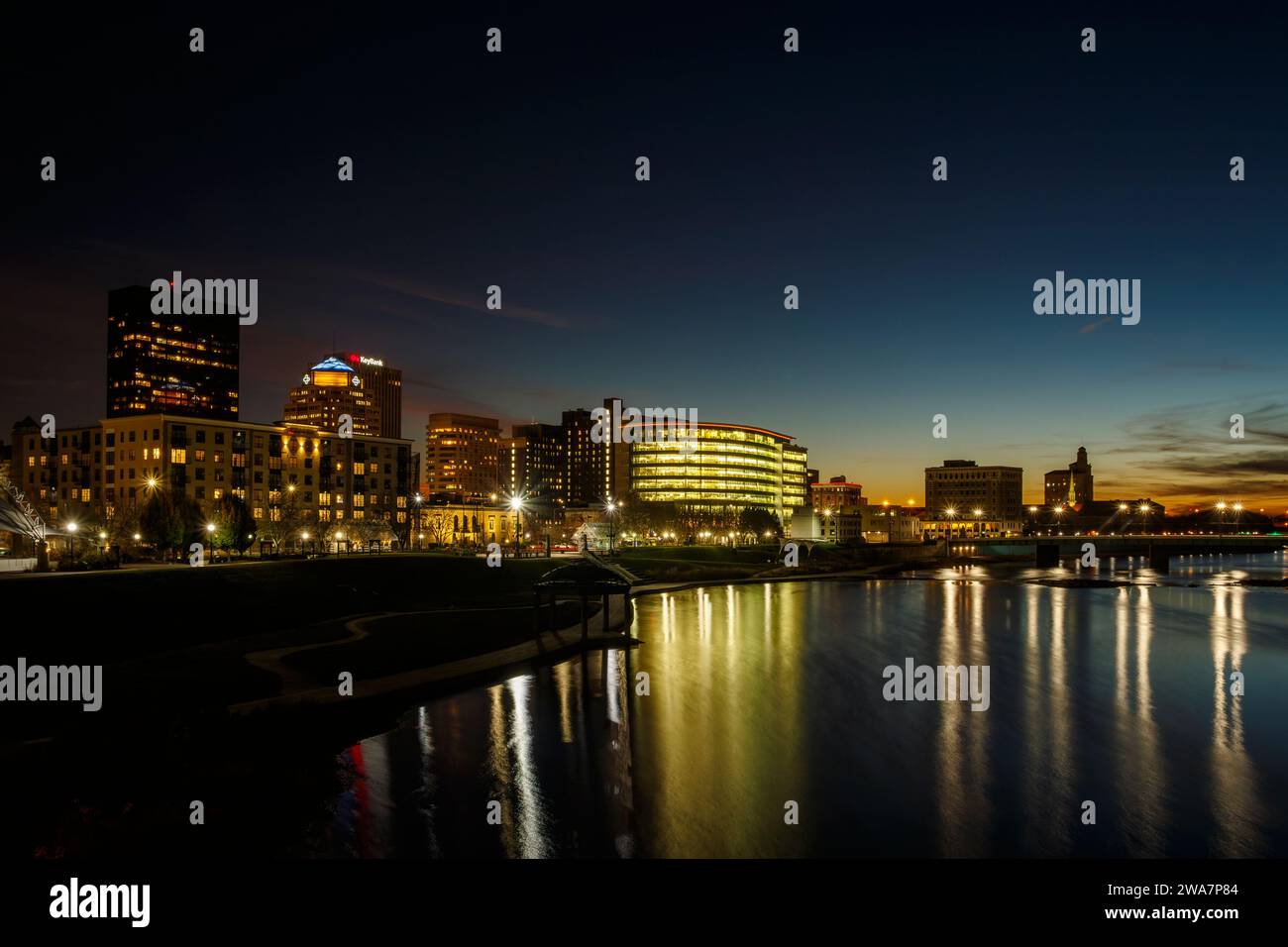 Dayton skyline at sunset. Miami River in foreground. Dayton, Ohio, USA ...