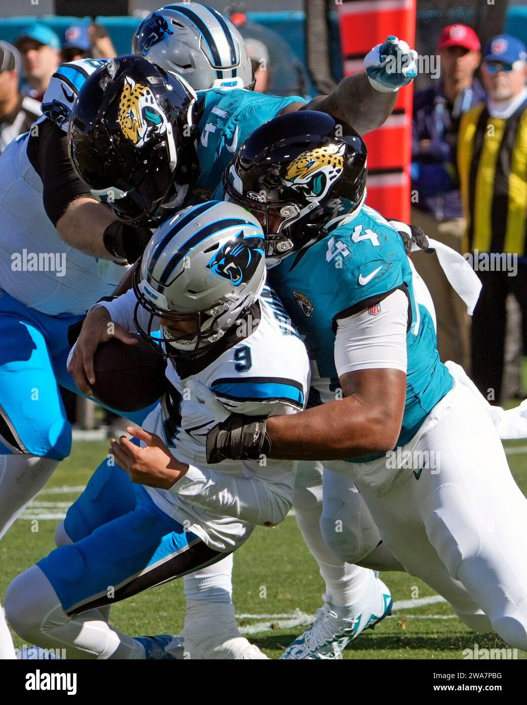 Jacksonville Jaguars linebacker Josh Allen, center, and linebacker ...