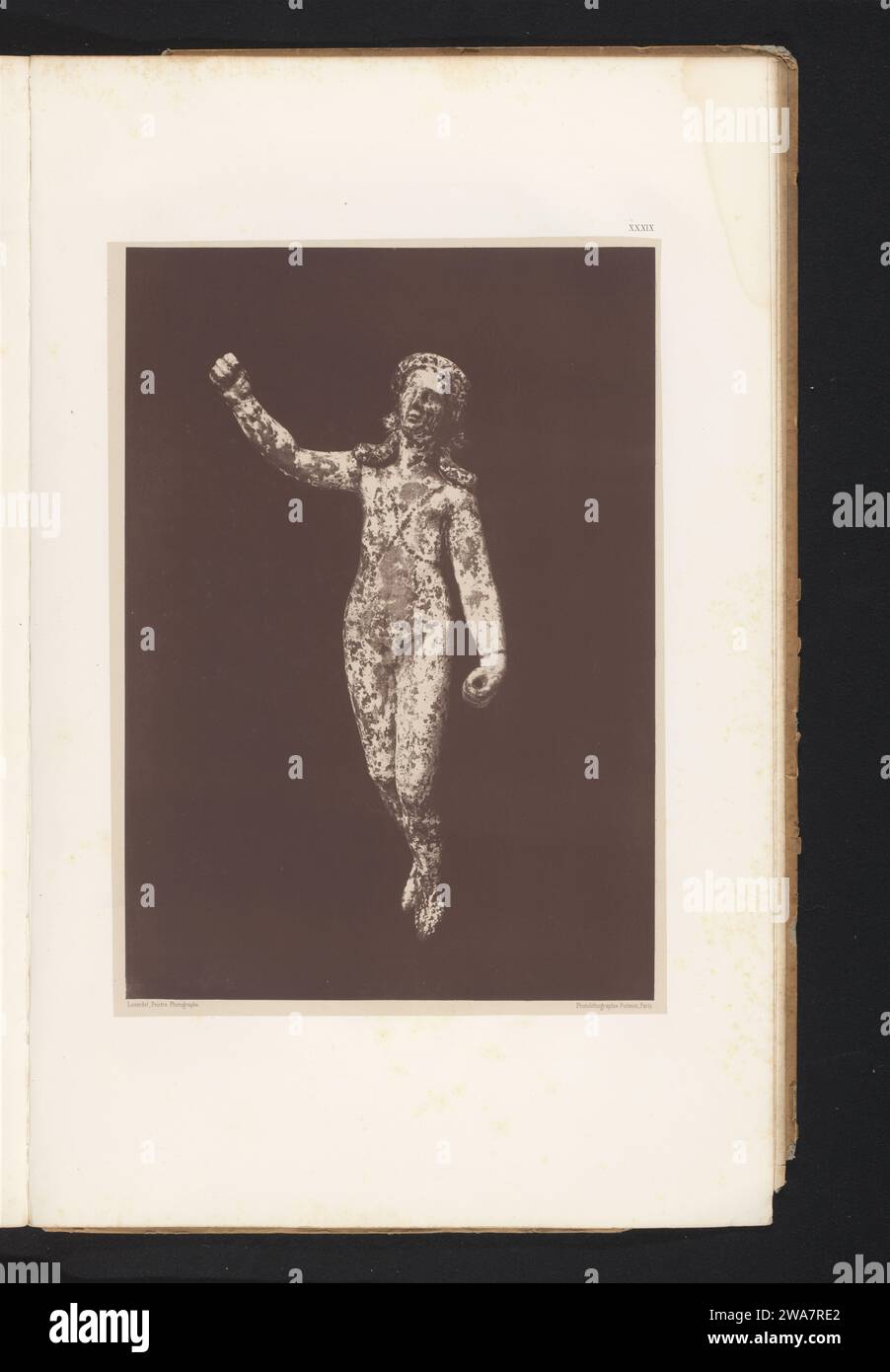 Terracotta sculpture of a jumping figure, presumably eros or a spirit ...