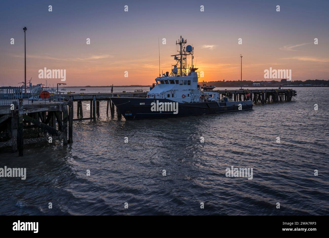 Pier and ship in the harbor of Harwich Stock Photo - Alamy