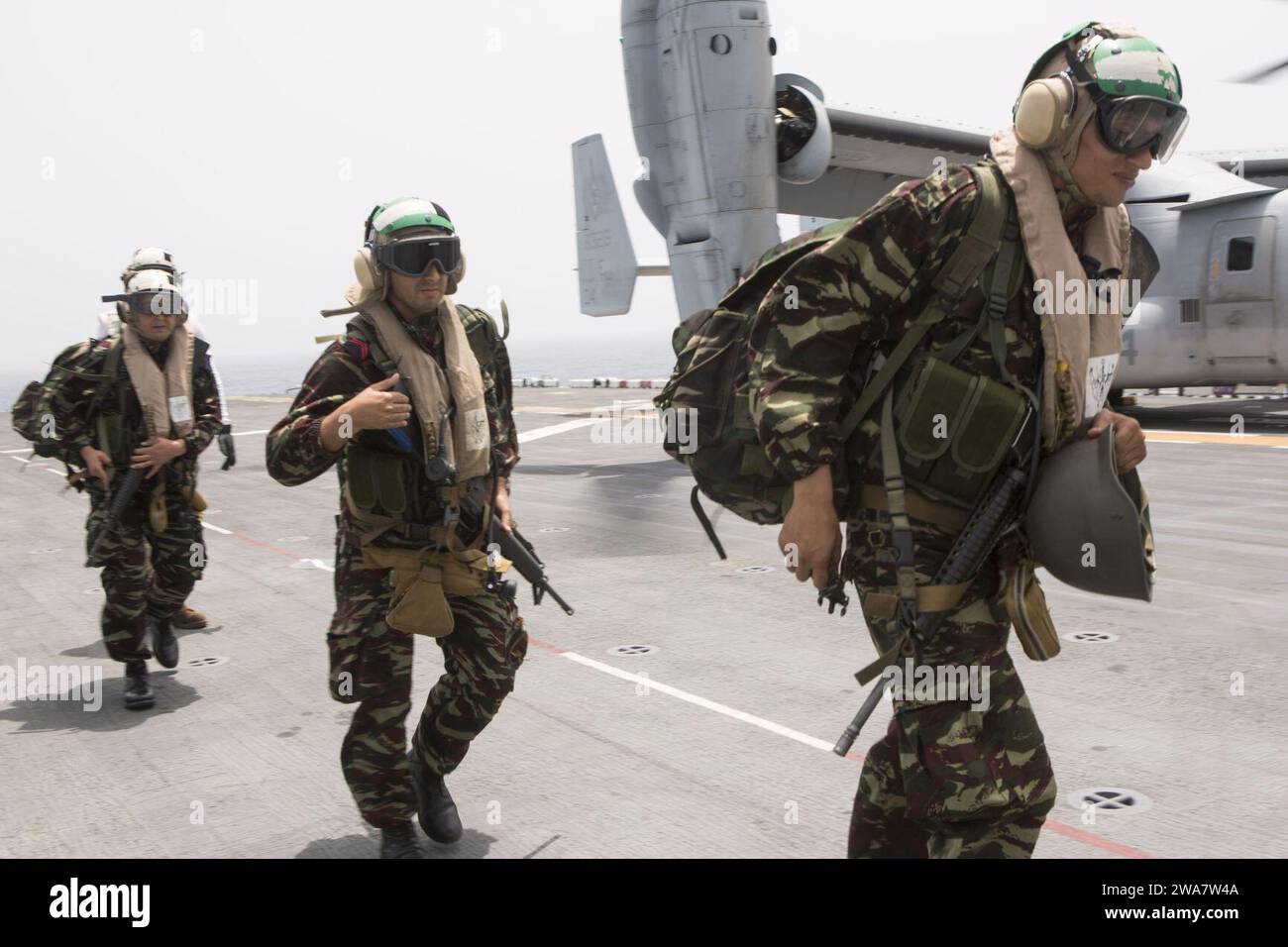 US military forces. U.S. Marines and Moroccan forces load onto a MV-22B ...