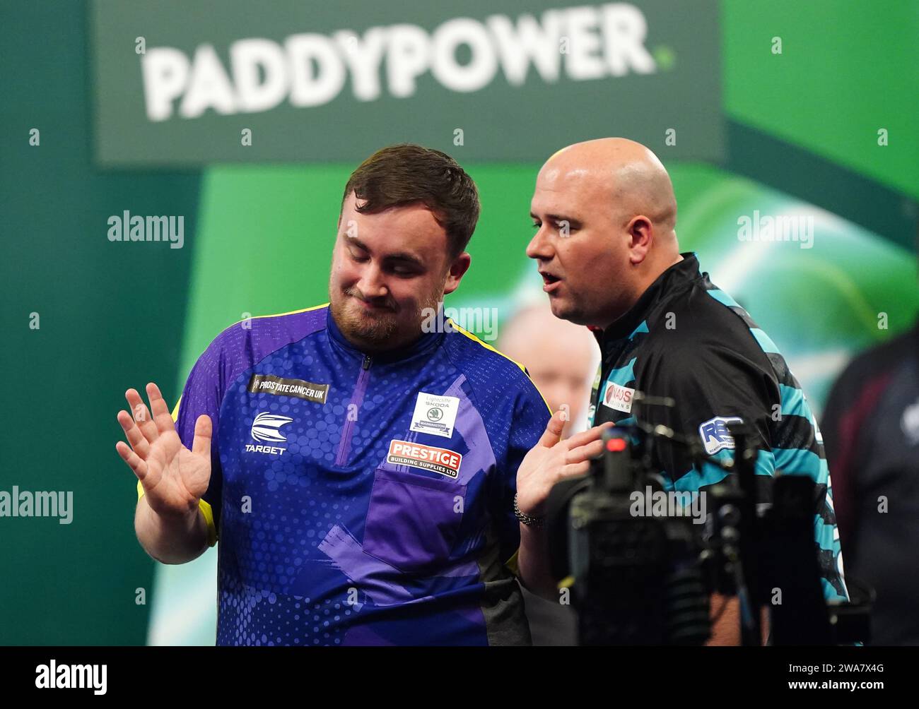 Luke Littler (left) celebrates victory in the semi-final against Rob ...