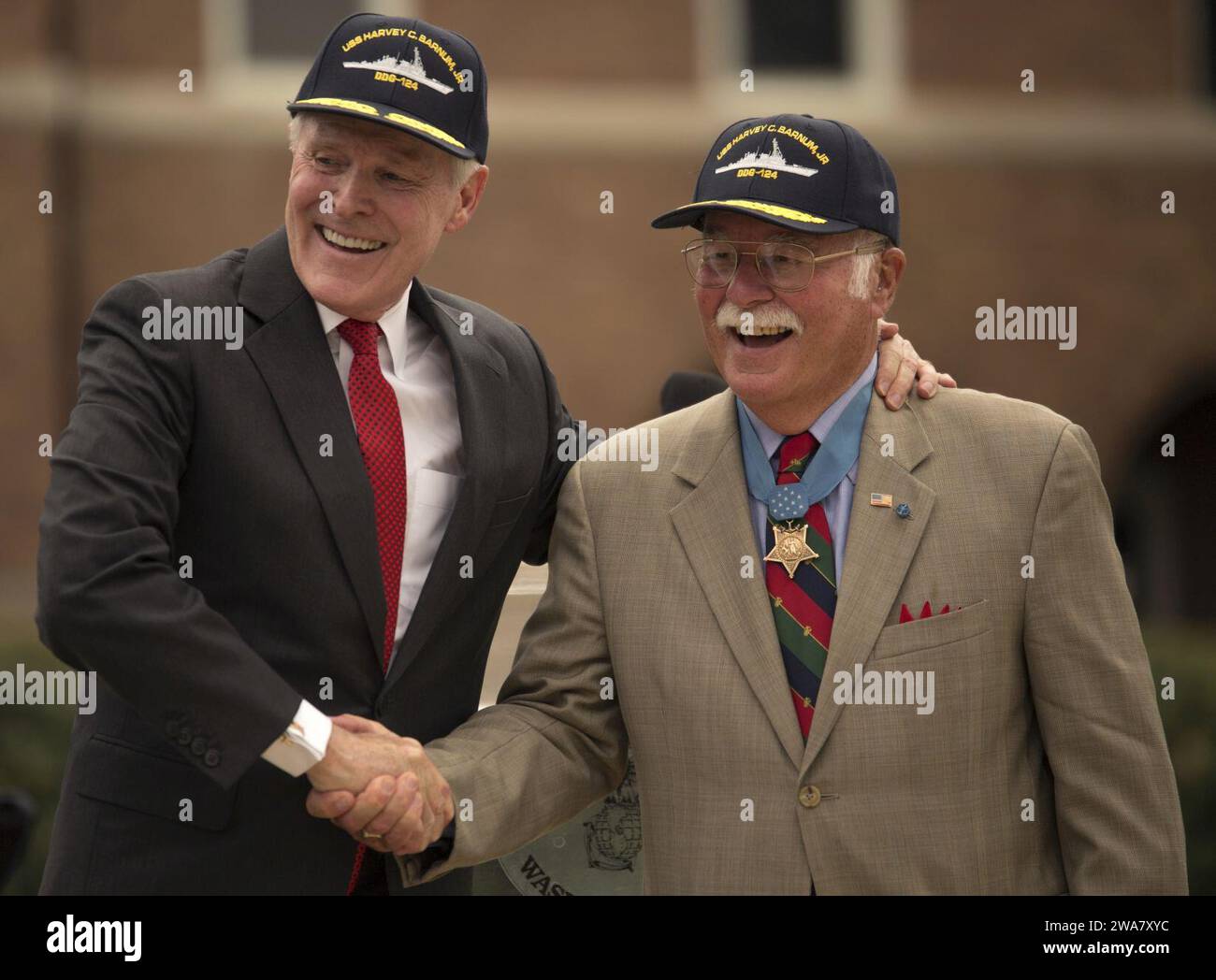 US military forces. Secretary of the Navy Ray Mabus shakes hands with ...