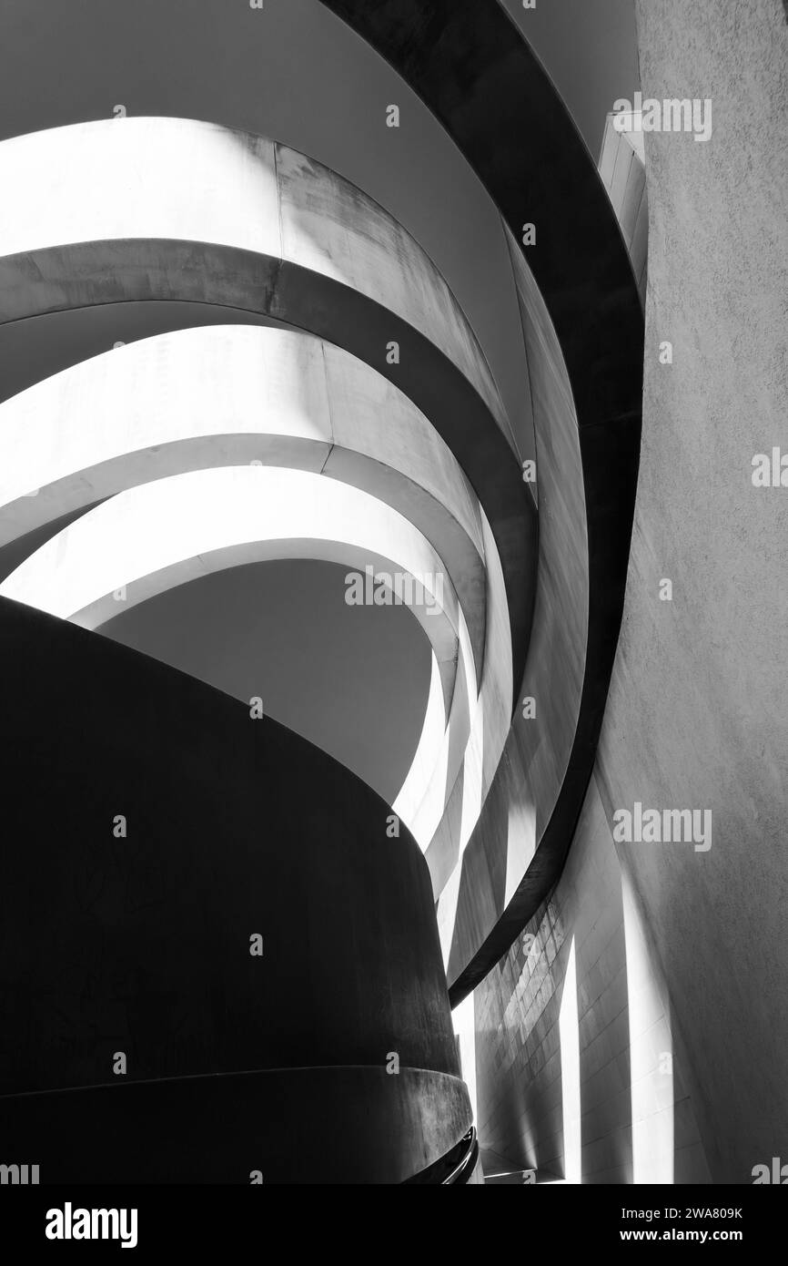 Striking monochrome architectural feature with sweeping curves and a ...