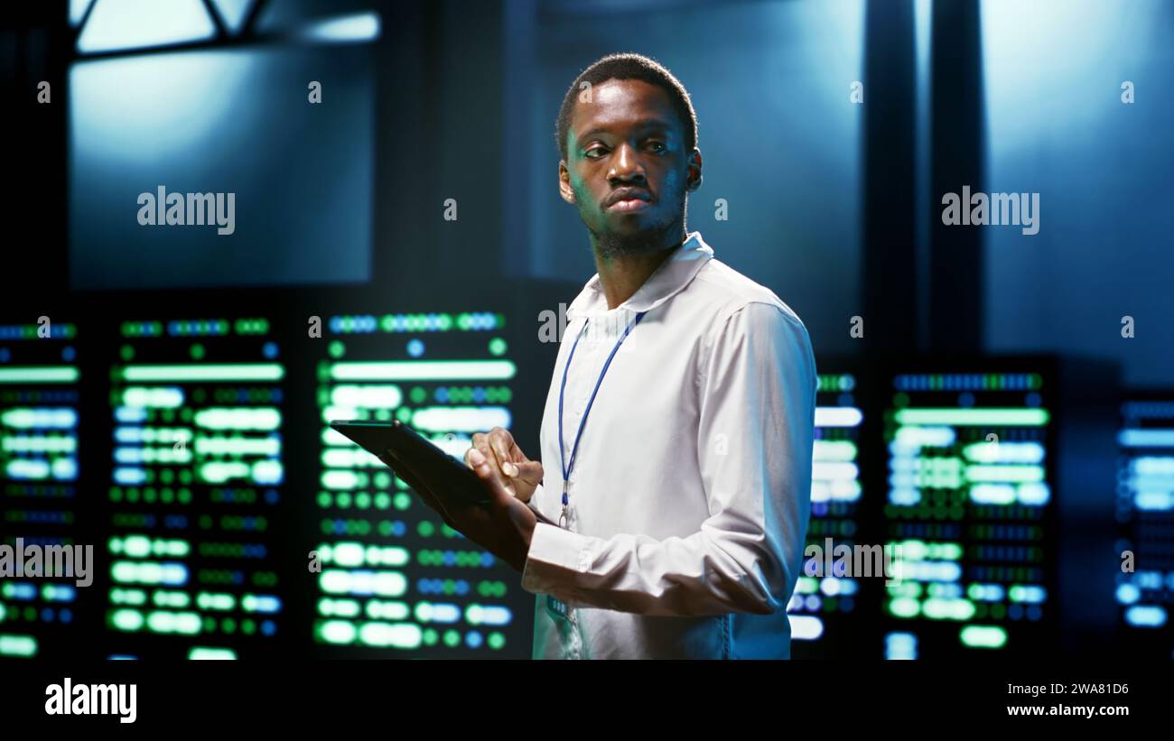 Computer Scientist Using Tablet To Check Server Room Security Features Protecting Against